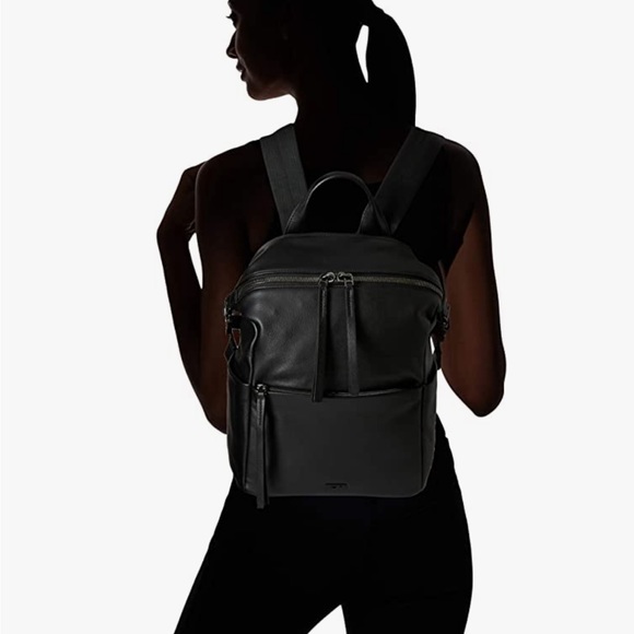 Tumi | Bags | Nwt Tumi Mezzanine Pat Backpack Black Leather | Poshmark